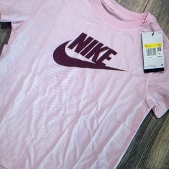 Nike | Shirts & Tops | Simple Design Features Vibrant Top | Poshmark